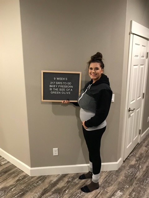 So happy im almost out of the first trimester ! Baby bump is growing ...