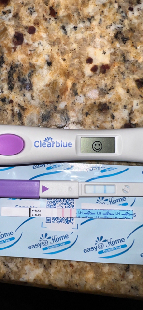 Anyone else had a low/high reading on OPK strip but solid smiley on ...