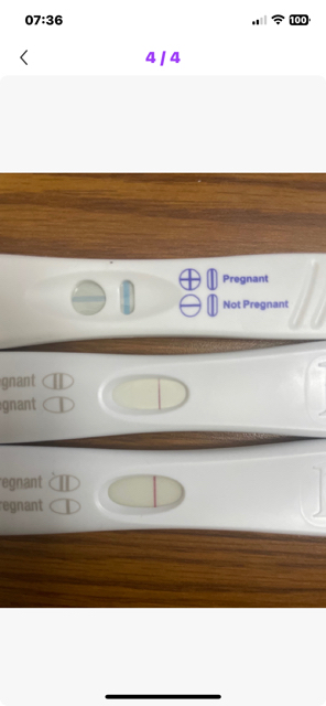 I personally see a faint line on the middle test. It's easier to see in ...